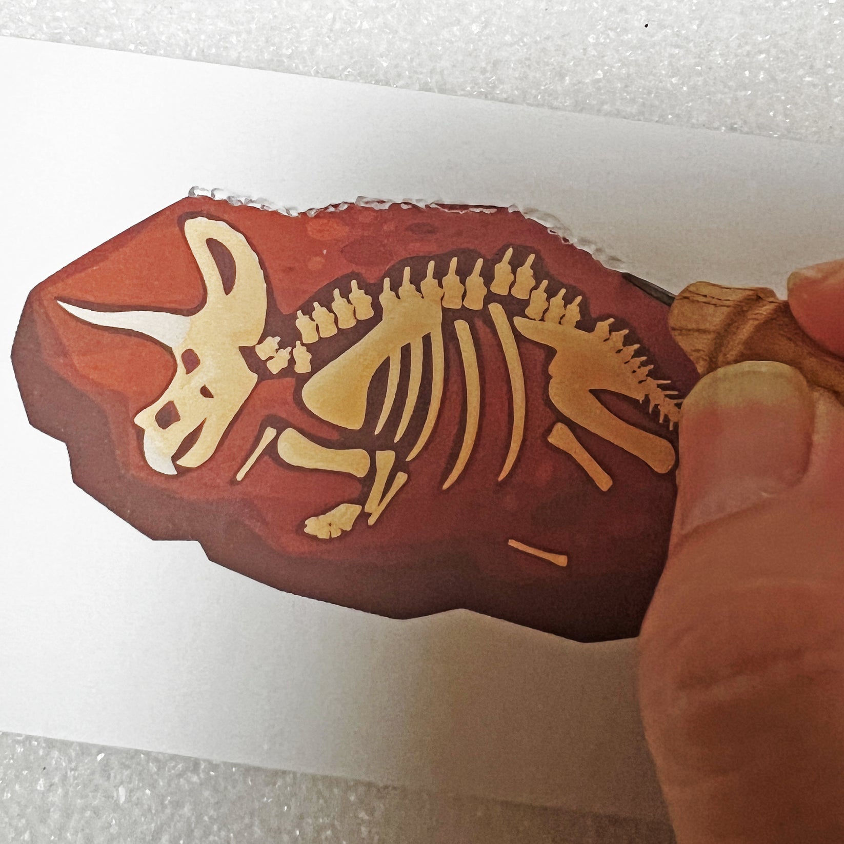 Pin Punching Work - Excavation of dinosaur fossils – Montessori ...