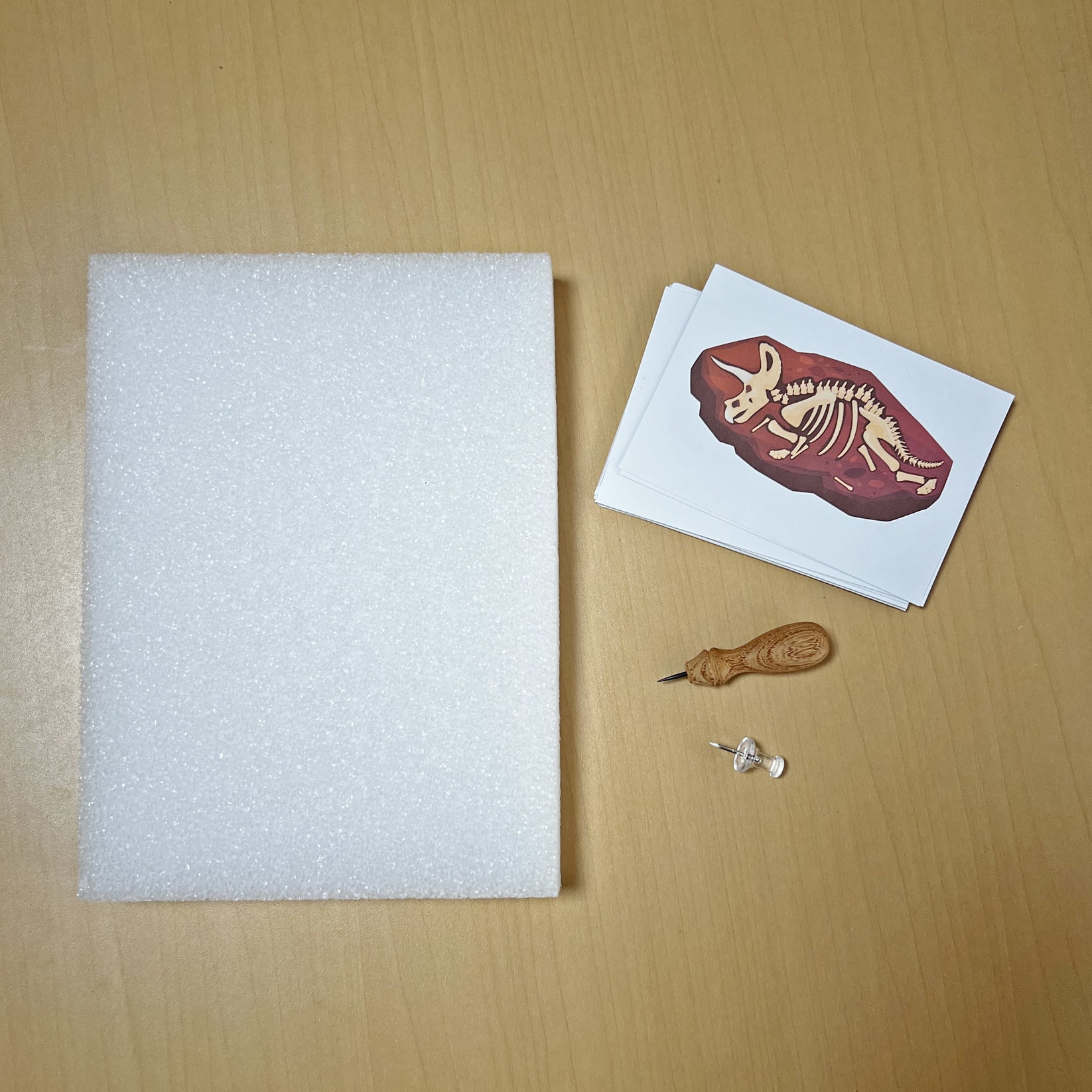 Pin Punching Work - Excavation of dinosaur fossils – Montessori ...