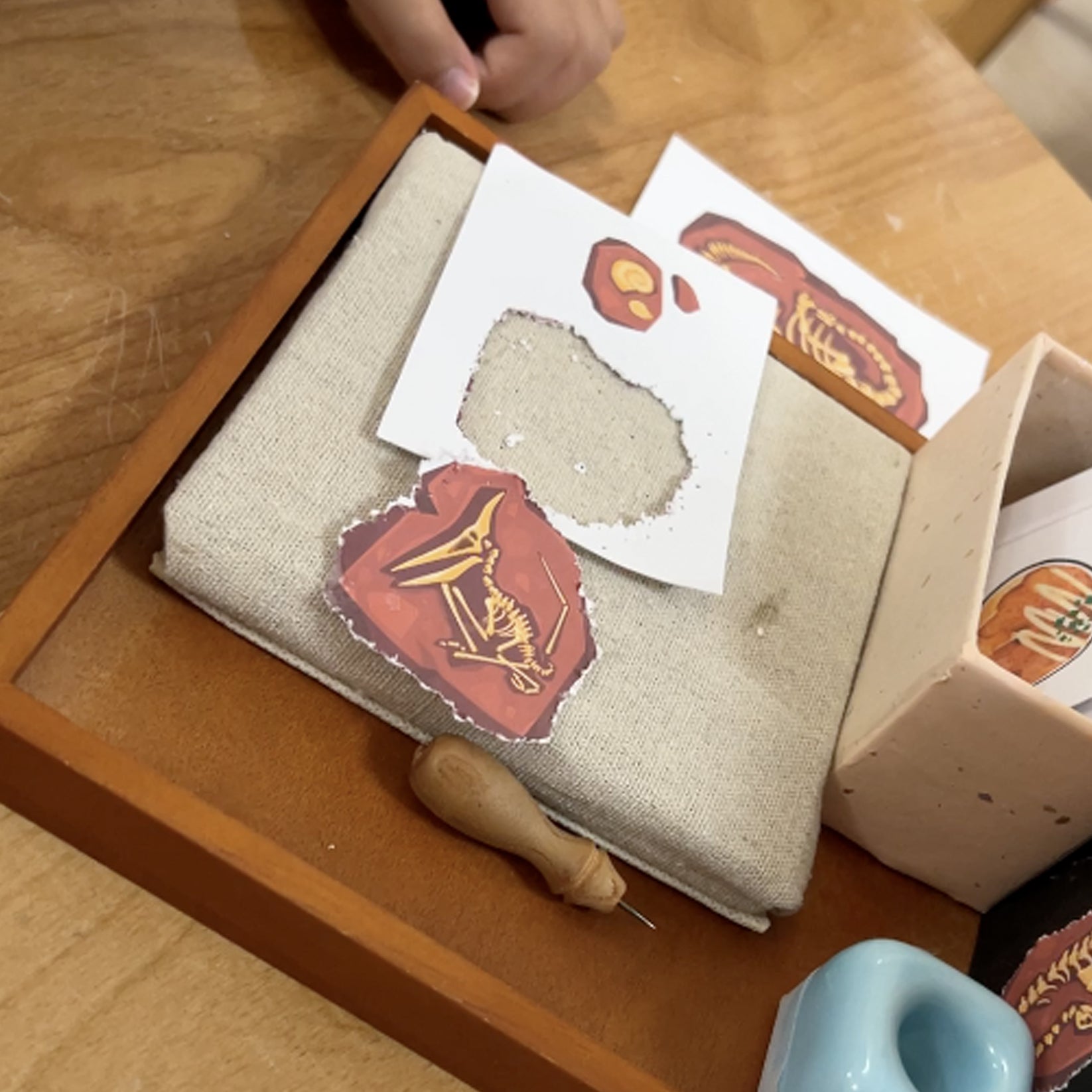 Pin Punching Work - Excavation of dinosaur fossils – Montessori ...